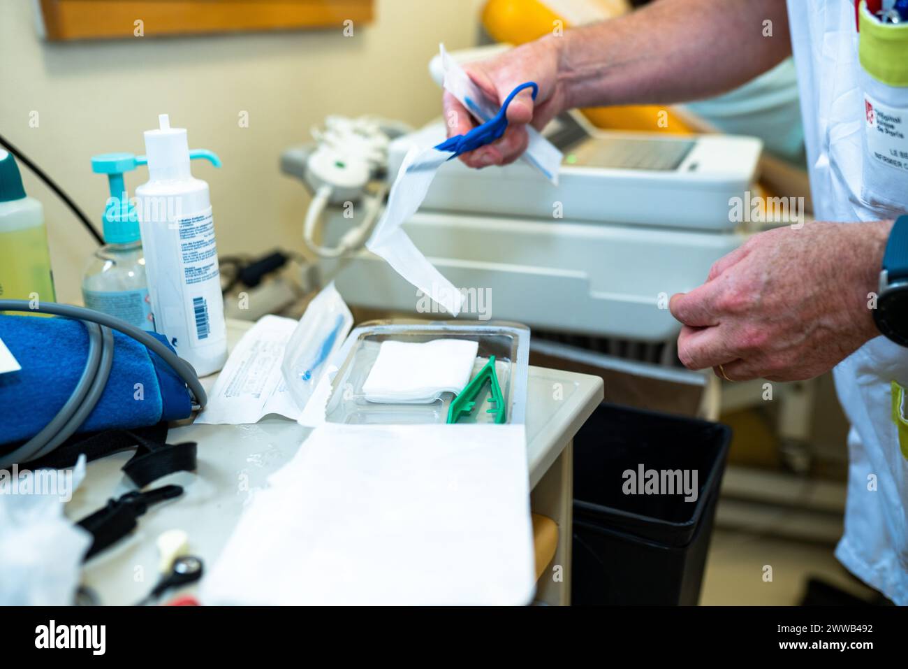 Care of a patient's foot ulcer. Wound cleaning and dressings Stock ...