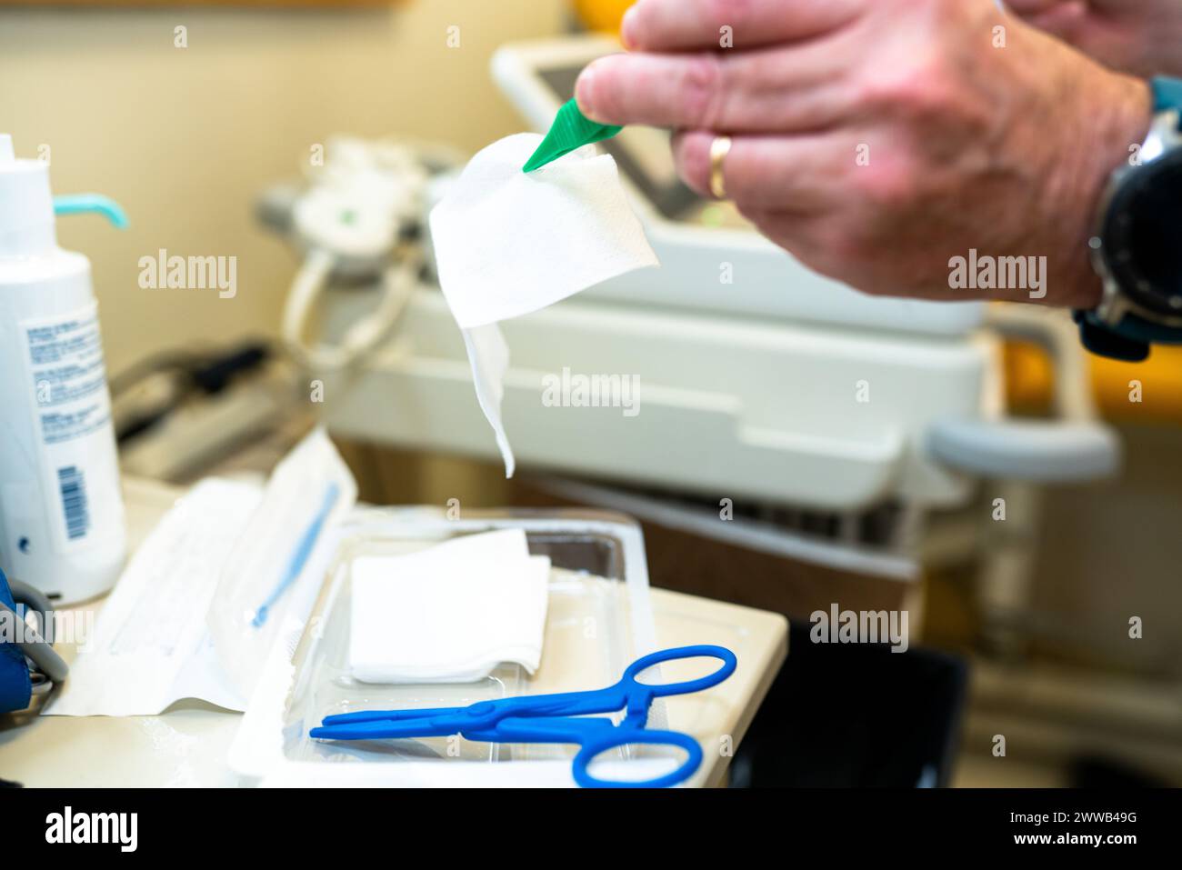 Care of a patient's foot ulcer. Wound cleaning and dressings Stock ...