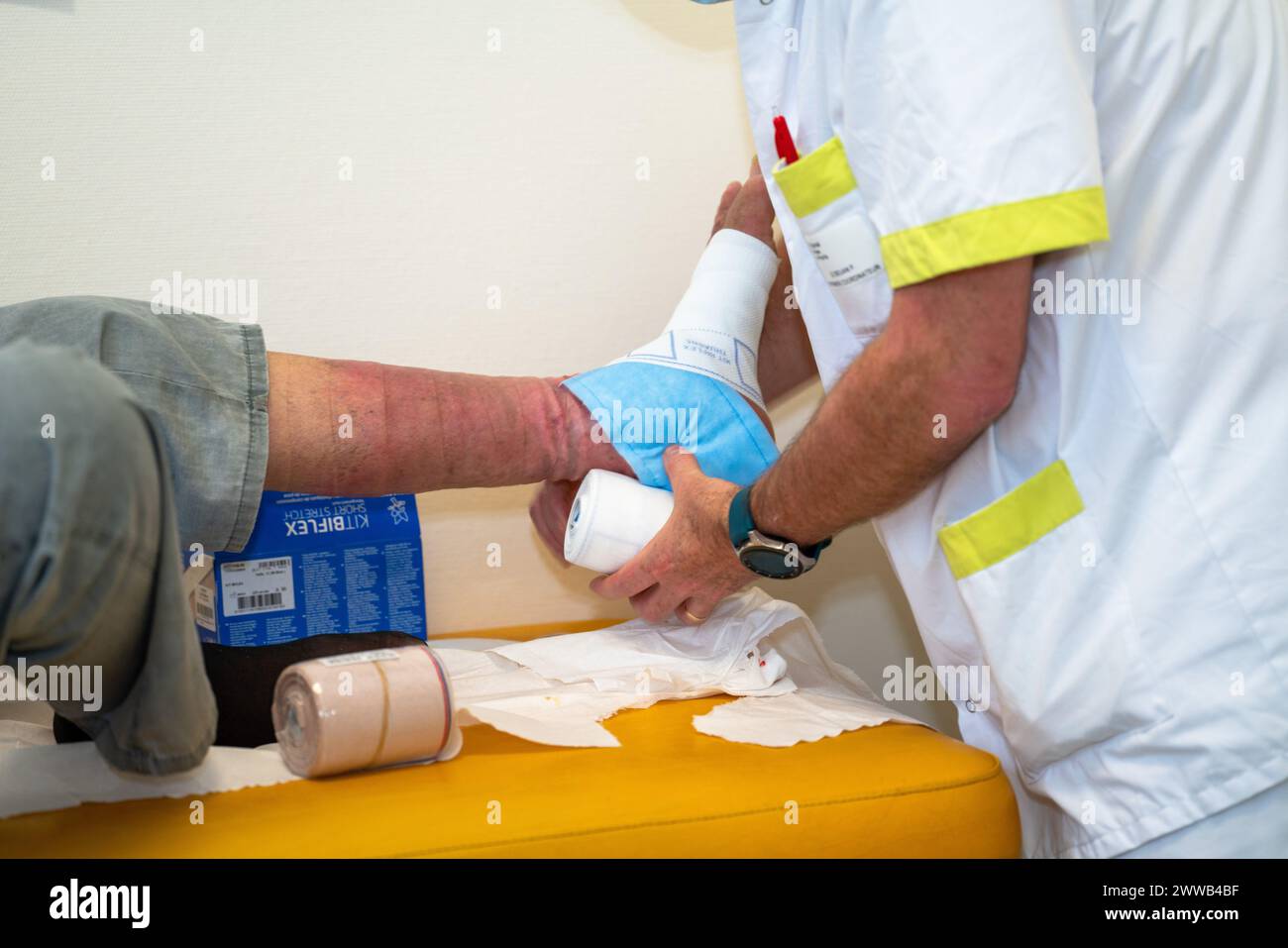 Care of a patient's foot ulcer. Wound cleaning and dressings Stock ...