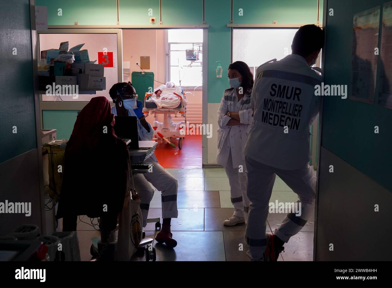Doctors in the emergency room of a university hospital. Important ...