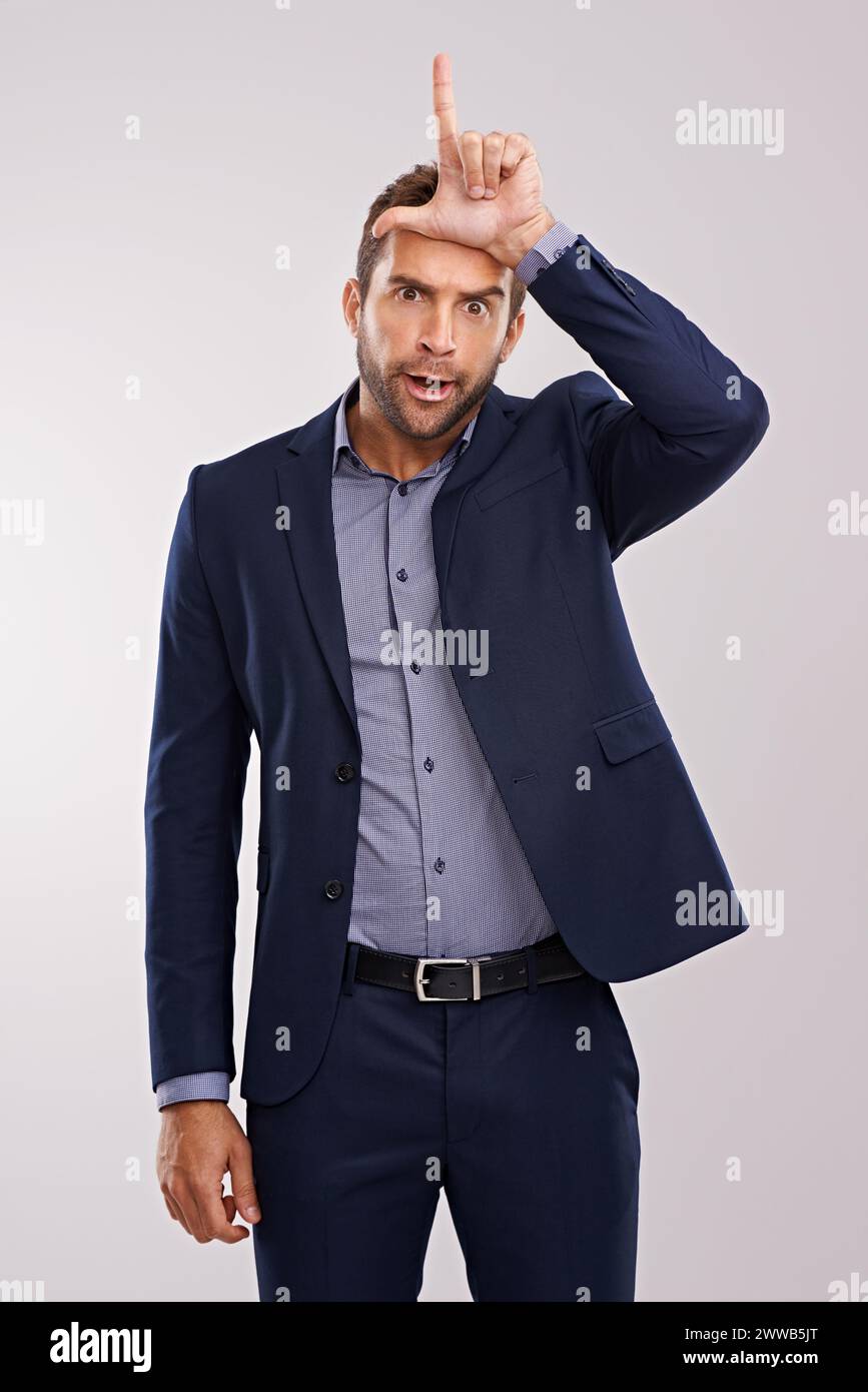 Portrait, loser gesture and man with business, fail and mistake on a ...