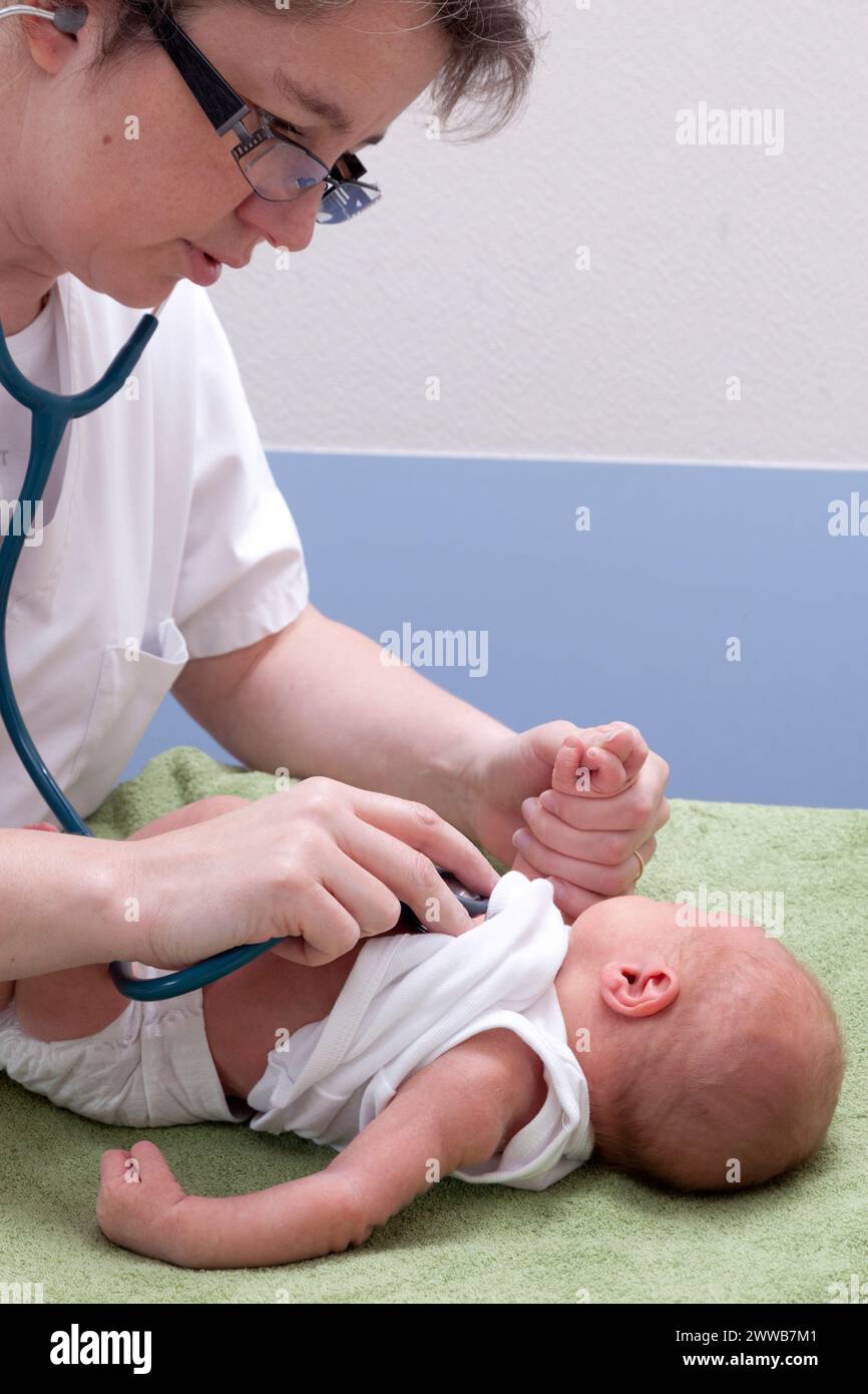 The pediatrician checks the newborn's heart rate. Saint Vincent de Paul ...