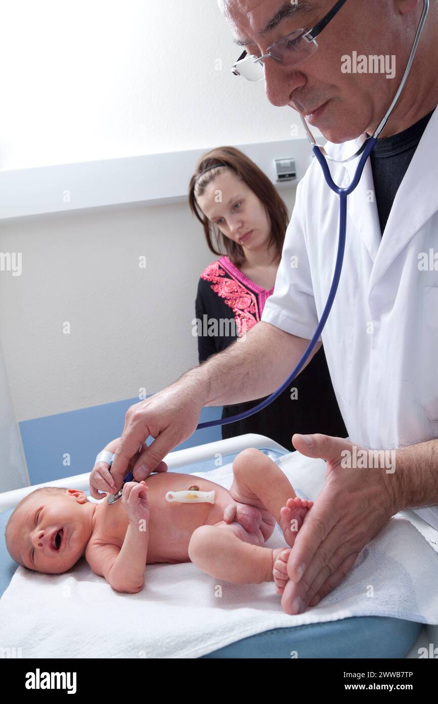 The pediatrician checks the newborn's heart rate. Saint Vincent de Paul ...