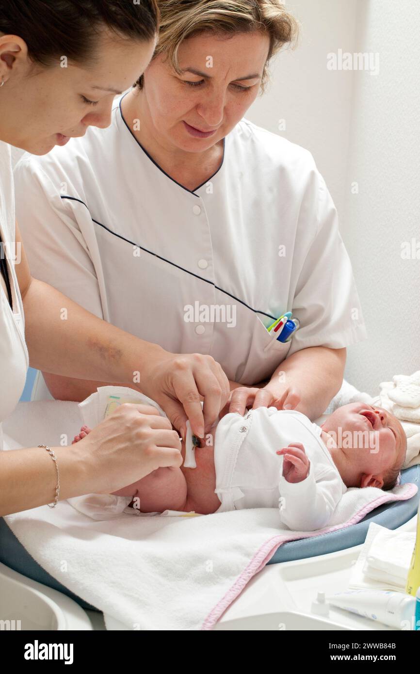 Umbilical cord care is performed with medical gauze. Saint Vincnet de ...