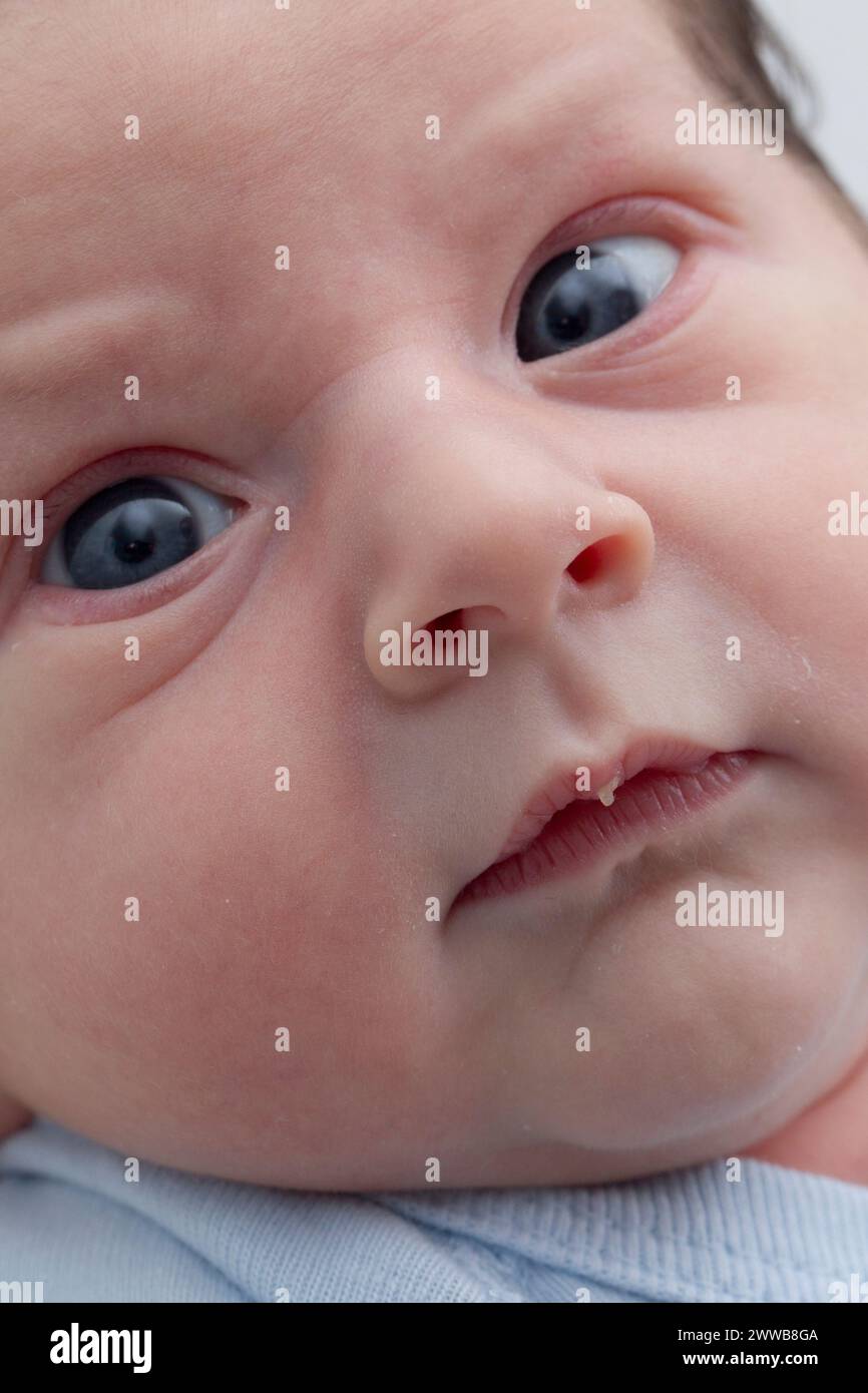 Baby squinting hi-res stock photography and images - Alamy