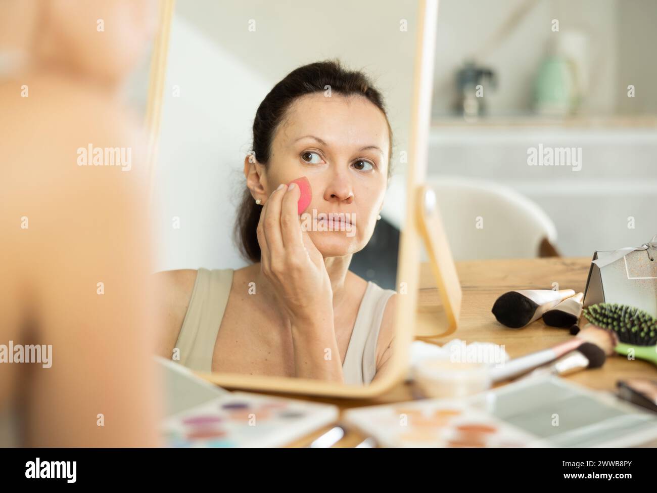 Beauty 40s woman foundation make up hi-res stock photography and images ...