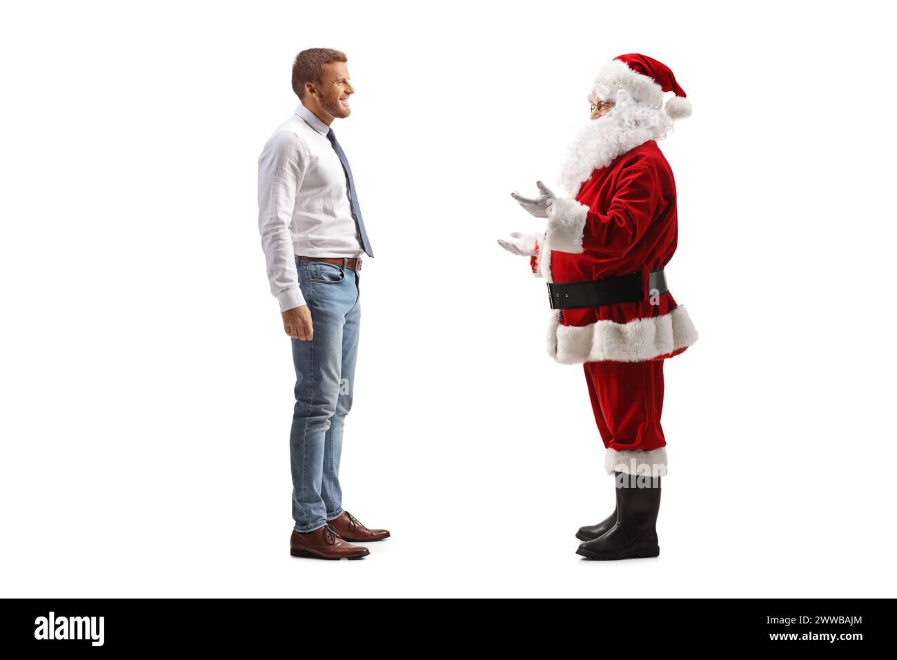 Santa Claus having a conversation with a man in shirt and jeans ...