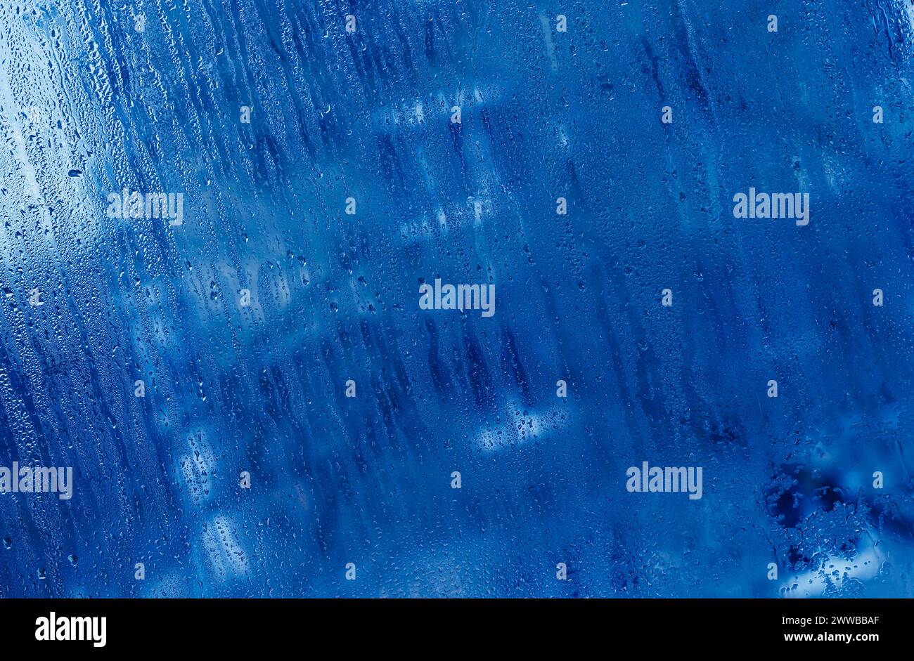 blue background of wet glass Stock Photo - Alamy
