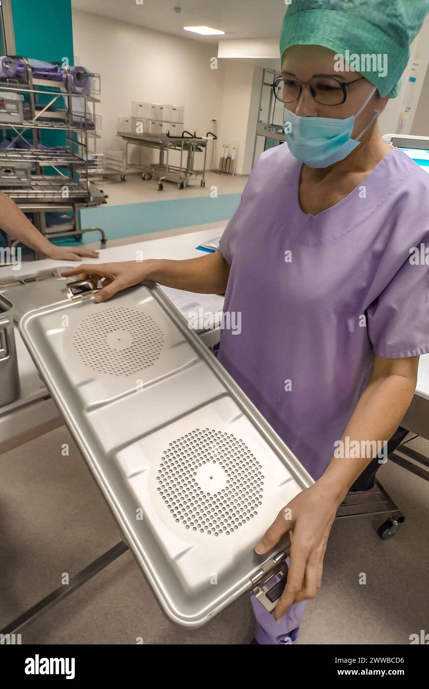 Operator showing tray with ventilation grille for ancillary equipment ...