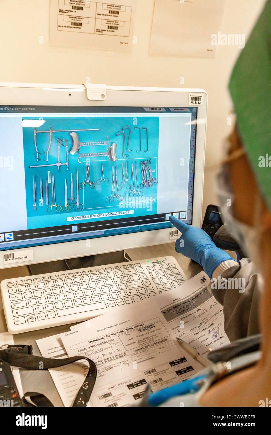 Technician checking the material entering the washing room before ...