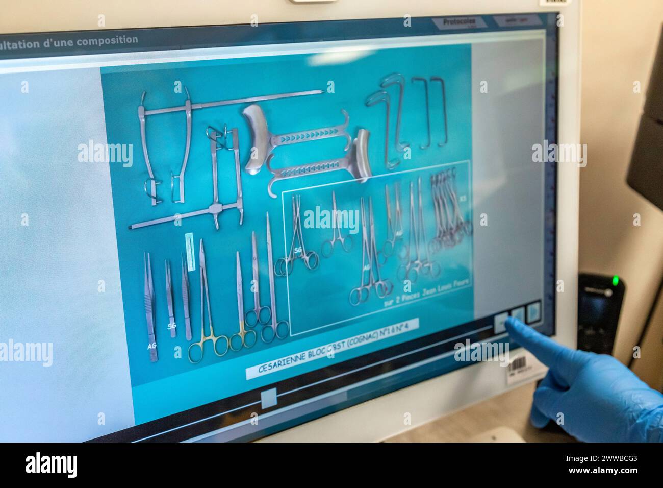 Technician checking the material entering the washing room before ...