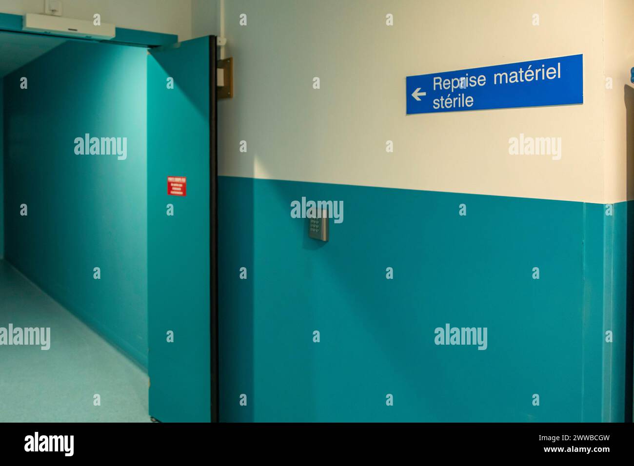 Corridor in the sterilization area with sterile equipment return sign ...