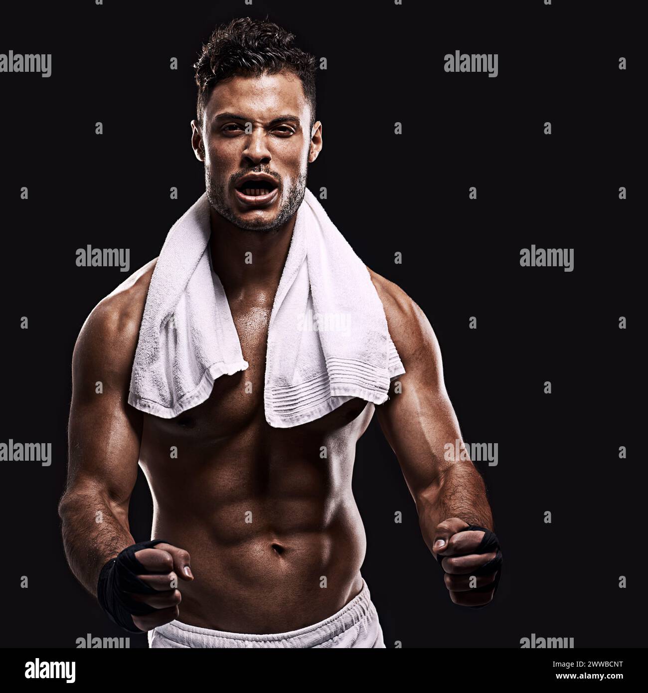 Fitness, body and screaming man portrait with gym towel in studio for ...