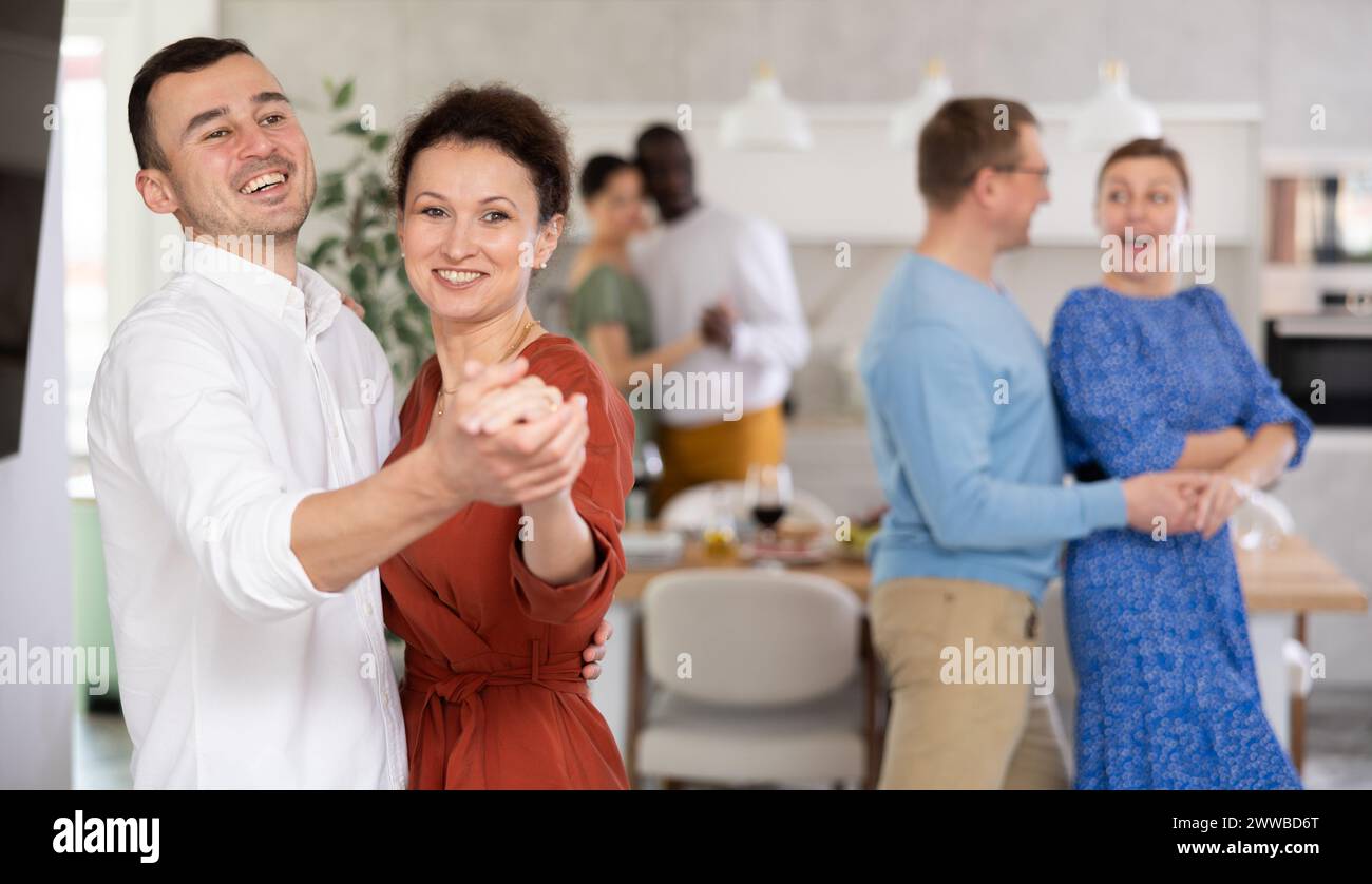 Couples of men and women dancing slow dance Stock Photo - Alamy