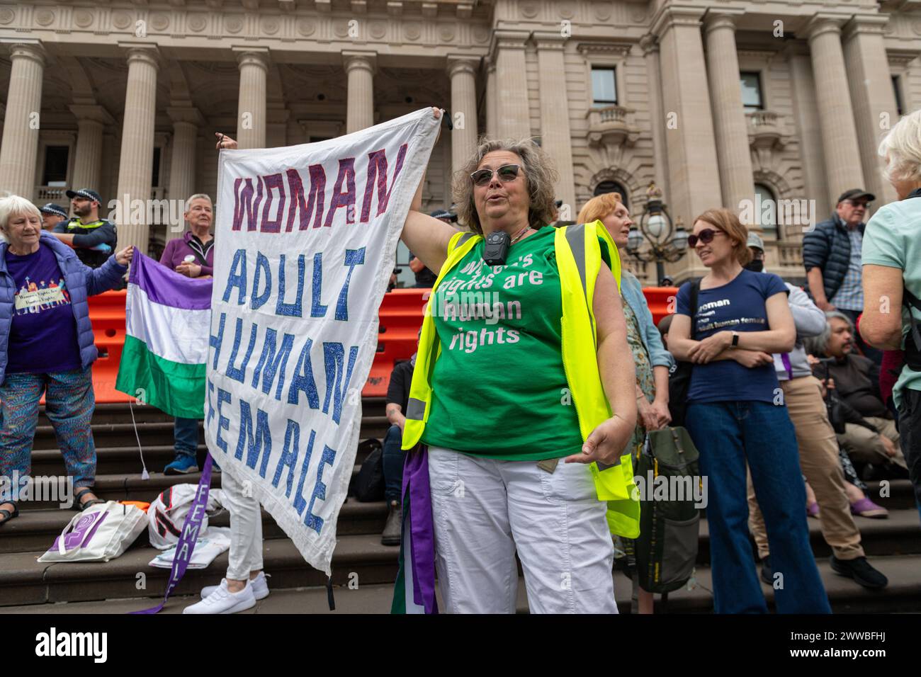Melbourne, Australia. 23rd Mar 2024. An anti-trans protester wears a t ...