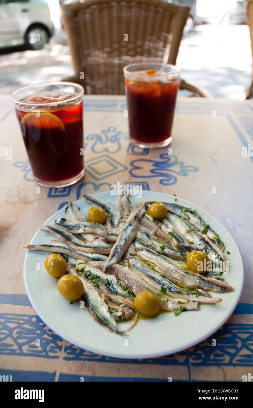 Pickled anchovy fillets and sangría for two. Madrid, Spain Stock Photo ...