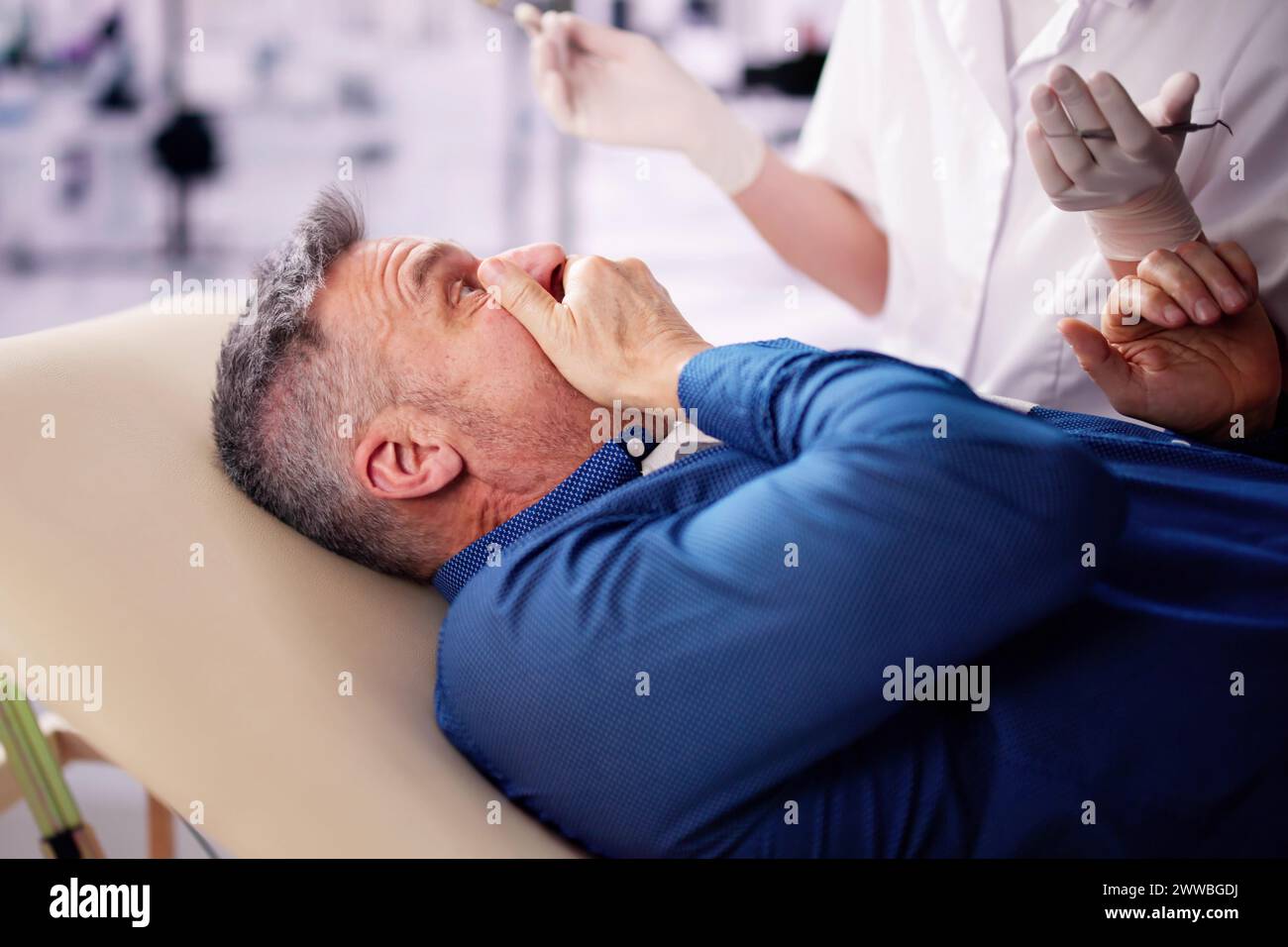 Scared Patient At Dentist. Toothache And Teeth Treatment Stock Photo ...