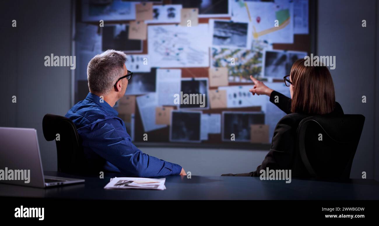 Two Private Detectives Searching Crime Investigation Board Stock Photo ...