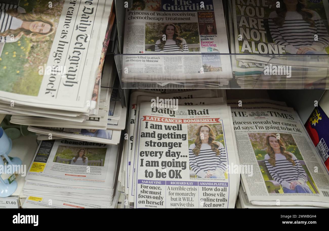 Front pages of national newspapers on display at a newsagents in north ...