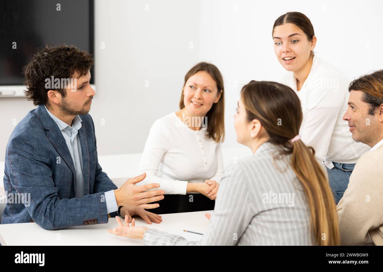 Colleagues sharing ideas and points of view, listening to each other ...