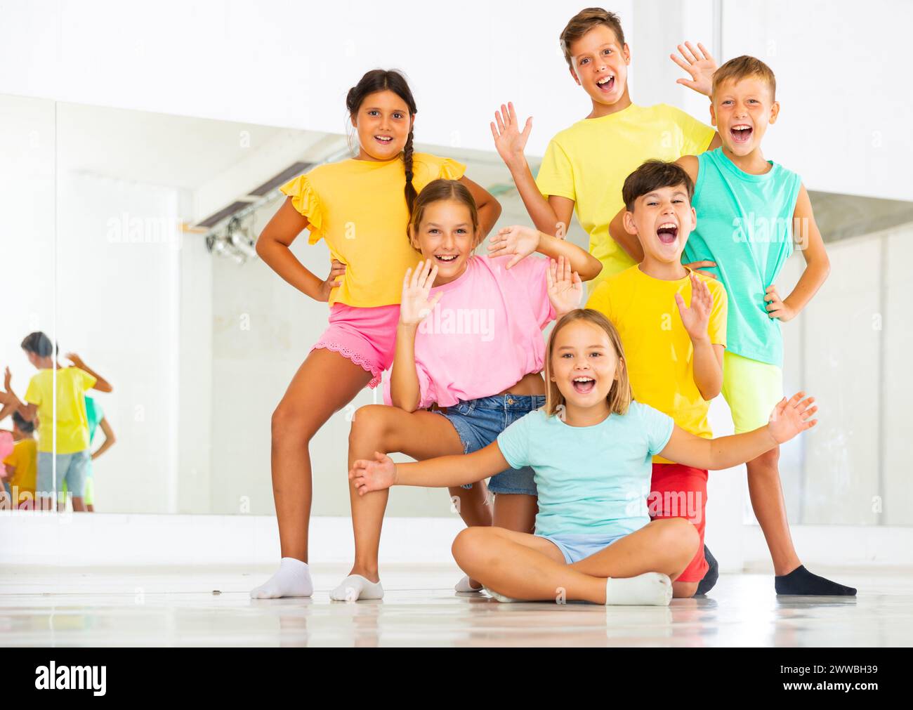 Happy children posing at modern dance class Stock Photo - Alamy