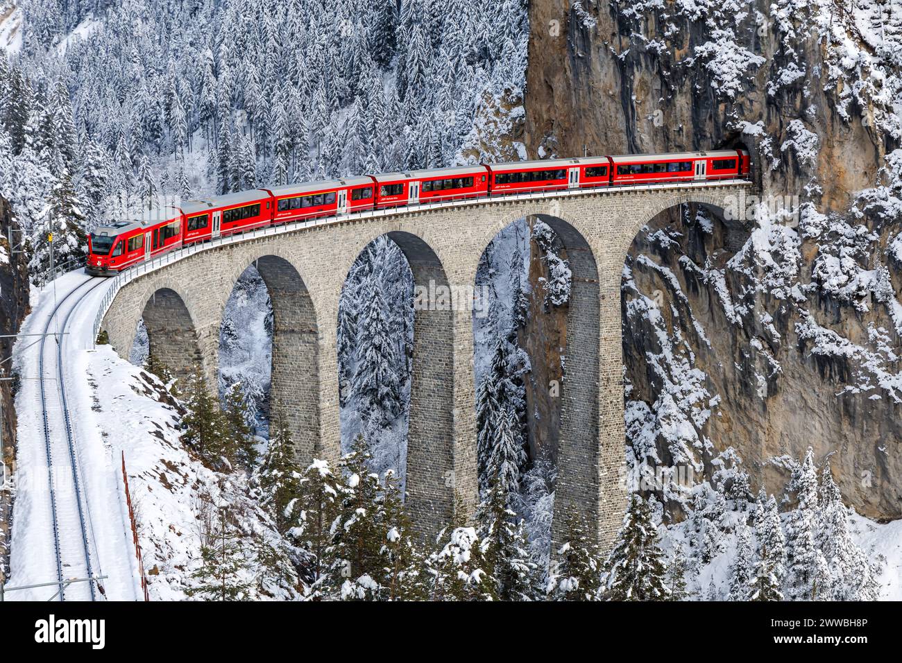 Filisur, Switzerland - January 10, 2024: Rhaetian Railway passenger ...