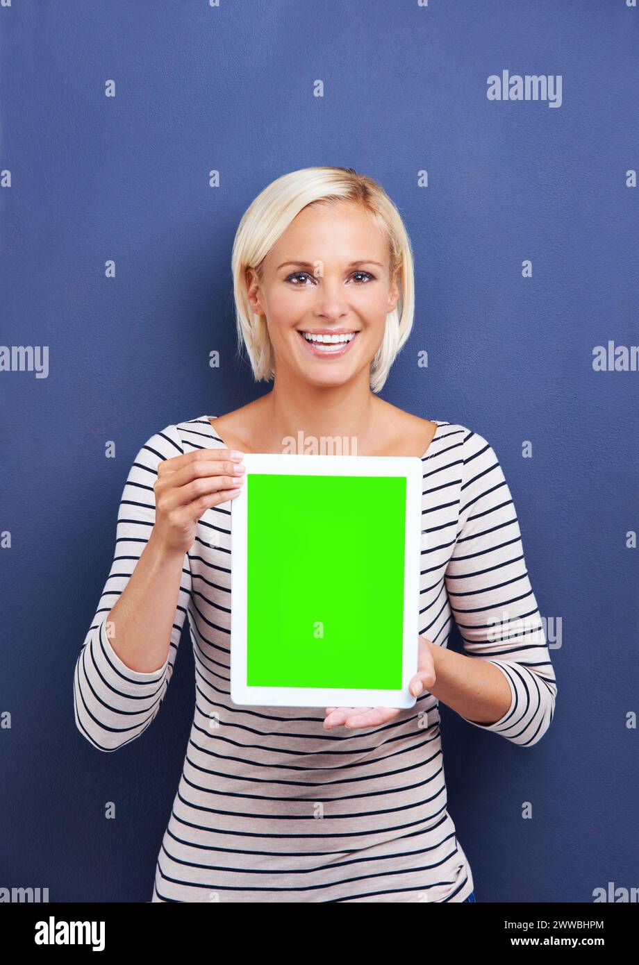 Portrait, green screen and woman with a tablet, smile and connection on ...