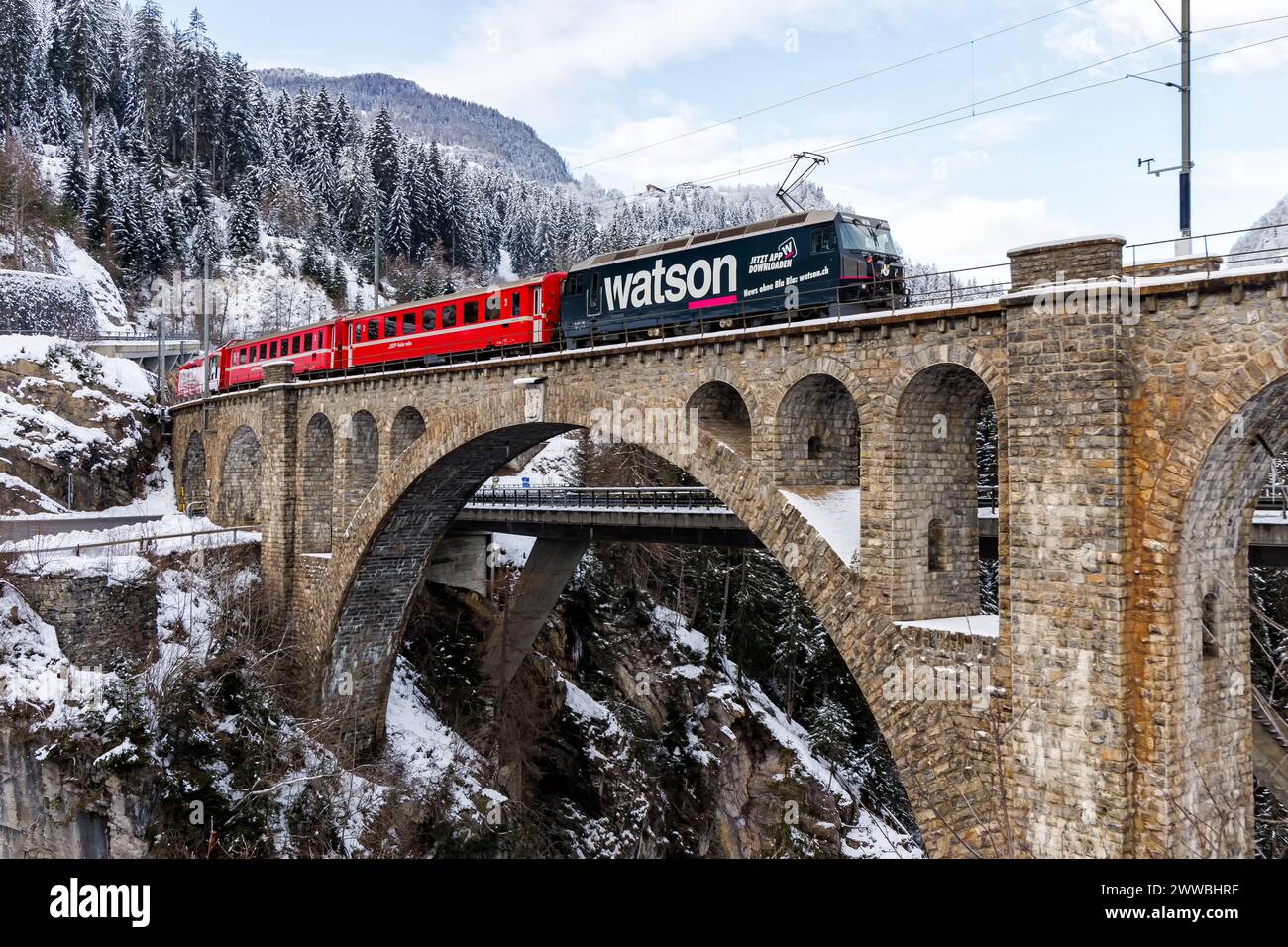 Solis, Switzerland - January 10, 2024: Rhaetian Railway passenger train ...