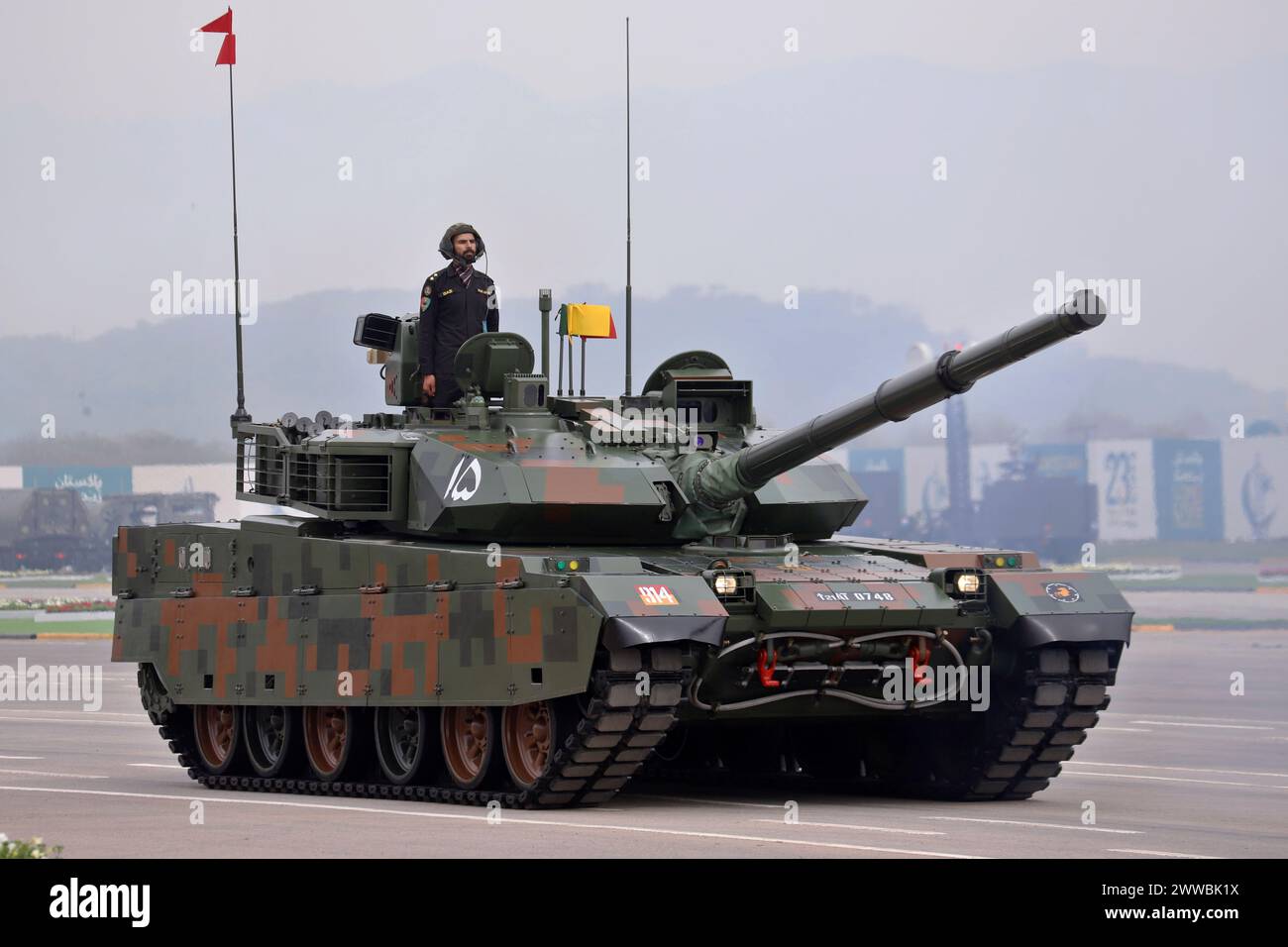 A Pakistani-made tank roll down during a military parade to mark ...