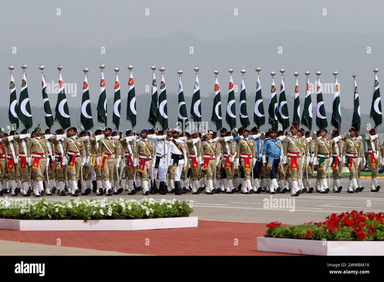 Pakistani troops march during a military parade to mark Pakistan ...