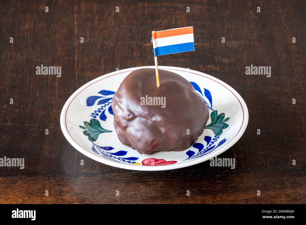 Traditional dutch pastry known as bossche bol decorated with dutch flag ...