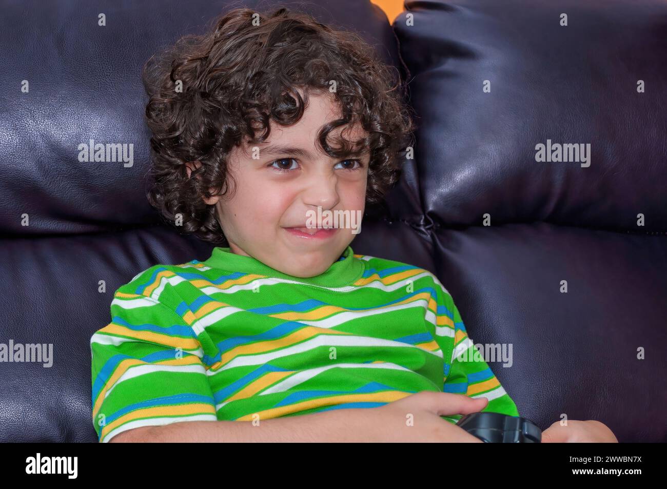 Close-up portrait of boy child emotions while gaming, Toronto, Canada ...