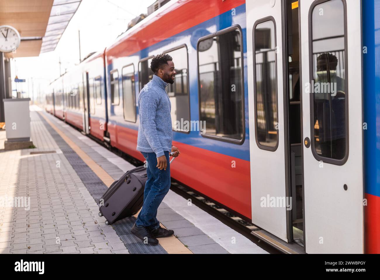 Man entering subway train hi-res stock photography and images - Alamy