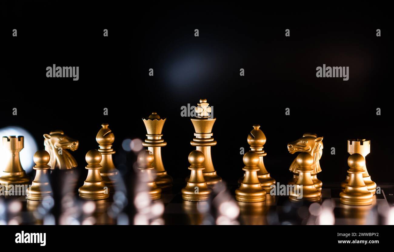 Golden chess pieces hi-res stock photography and images - Alamy