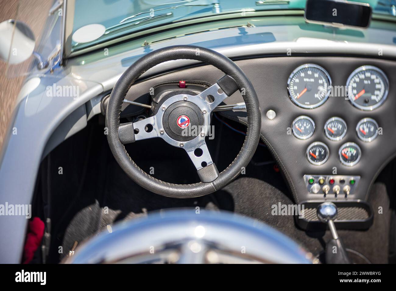 LINTHE, GERMANY - MAY 27, 2023: The interior of sports car AC Cobra 427, 1974. Art lens. Swirl ...