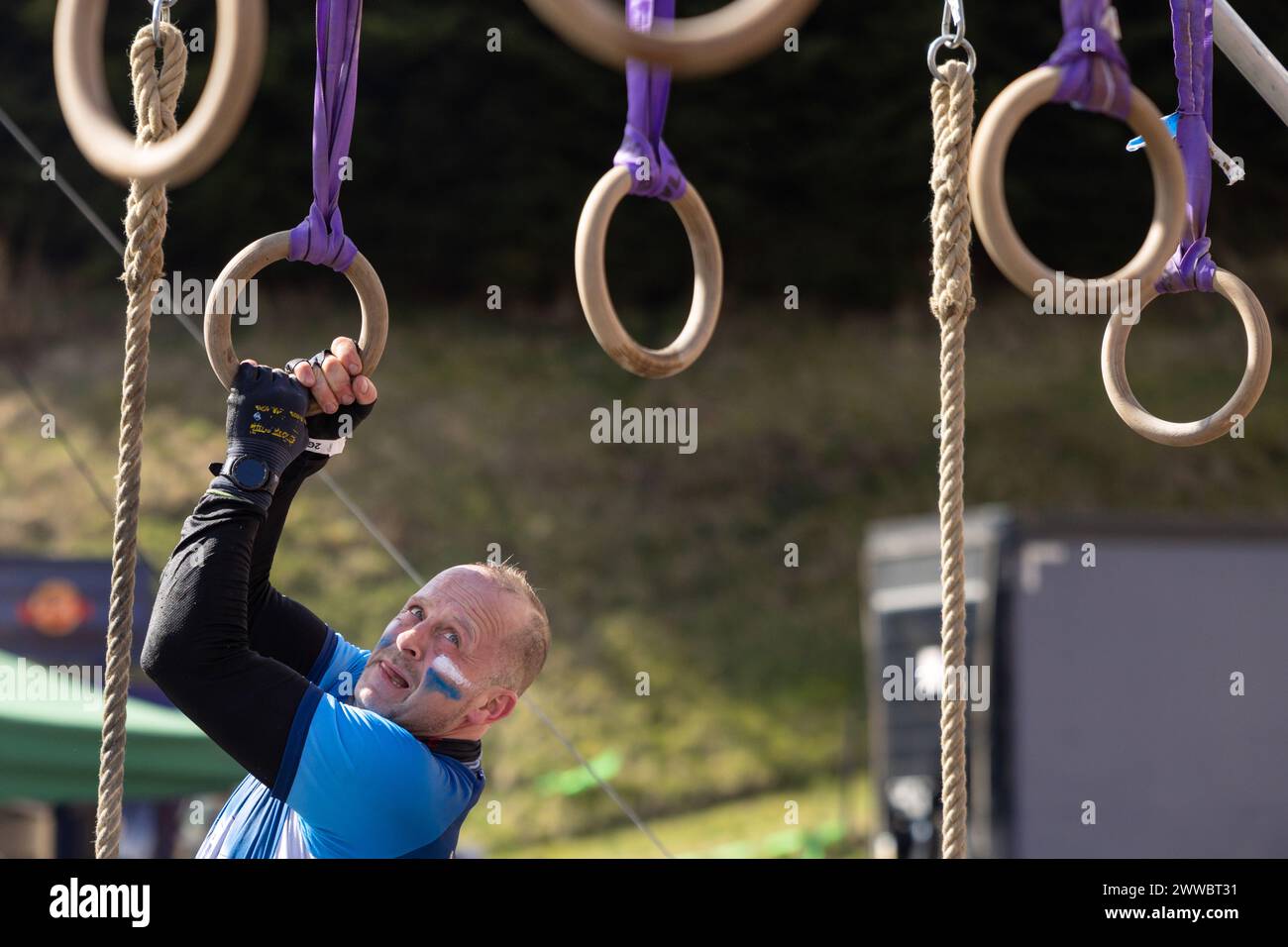 23 March 2024, Thuringia, Steinach: A participant overcomes a climbing ...
