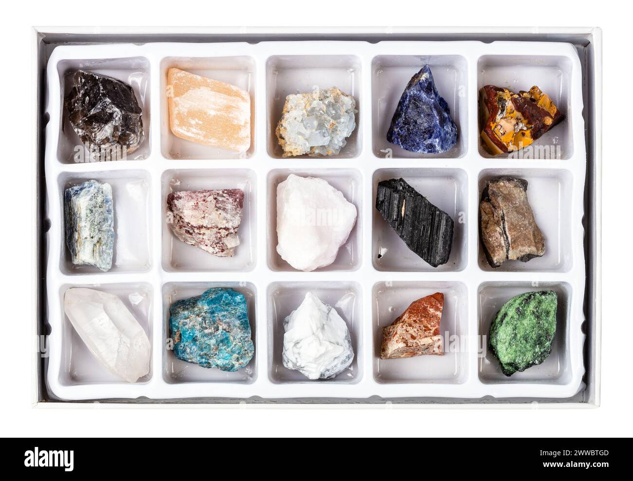 top view on natural raw stones for geological collection in open box ...