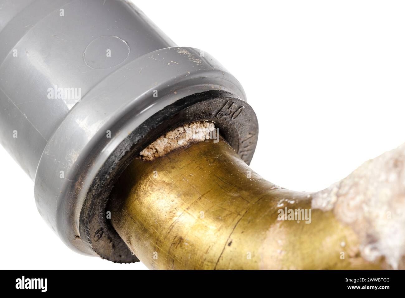 salt deposits on plastic elbow of drain pipe close up isolated on white ...