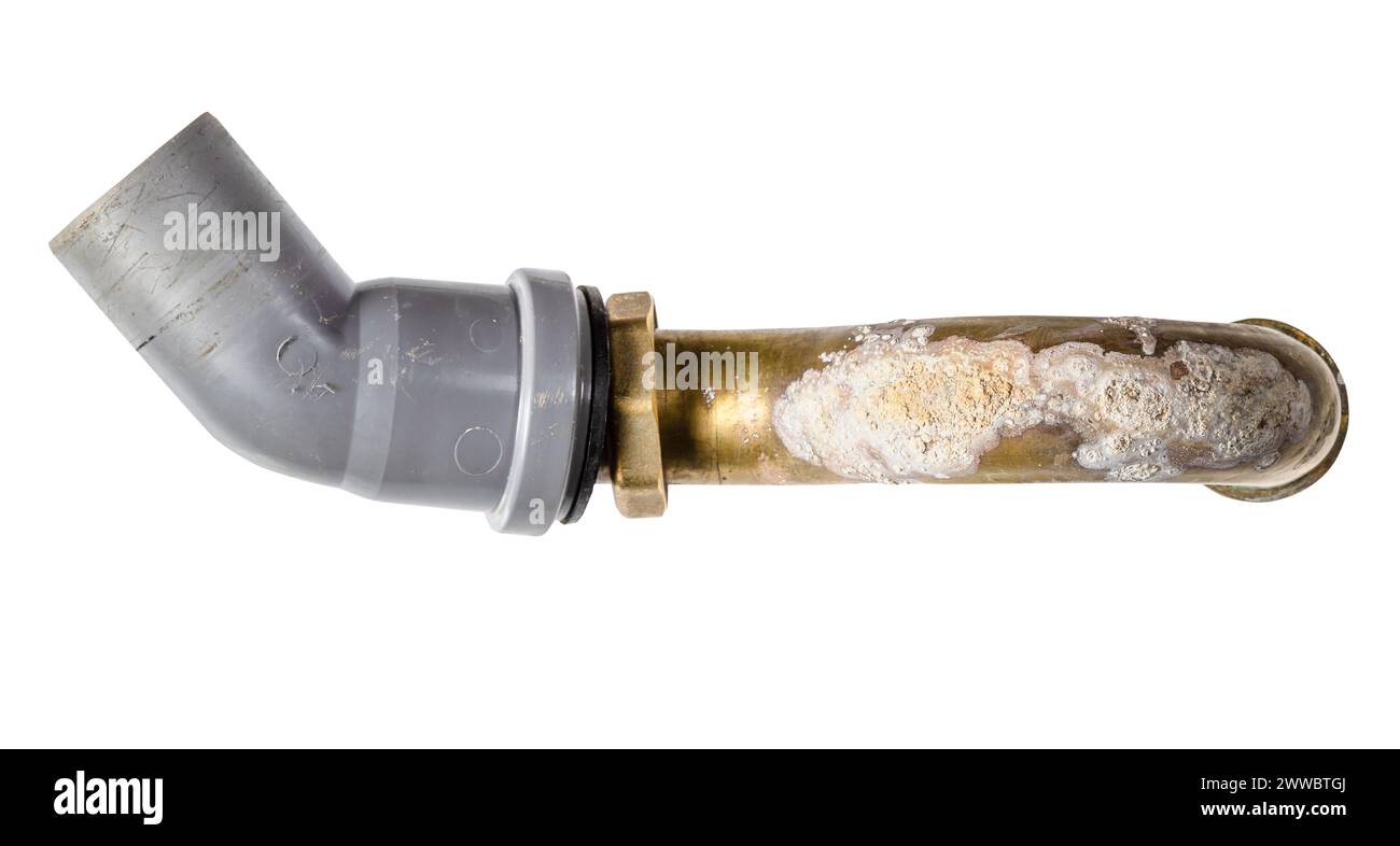 Corroded brass bathtub sewer pipe with plastic elbow isolated on white ...