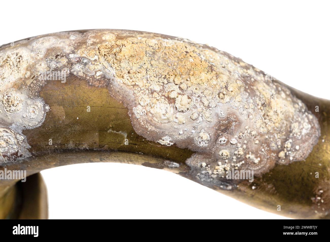 salt deposits on brass drain pipe close up isolated on white background ...