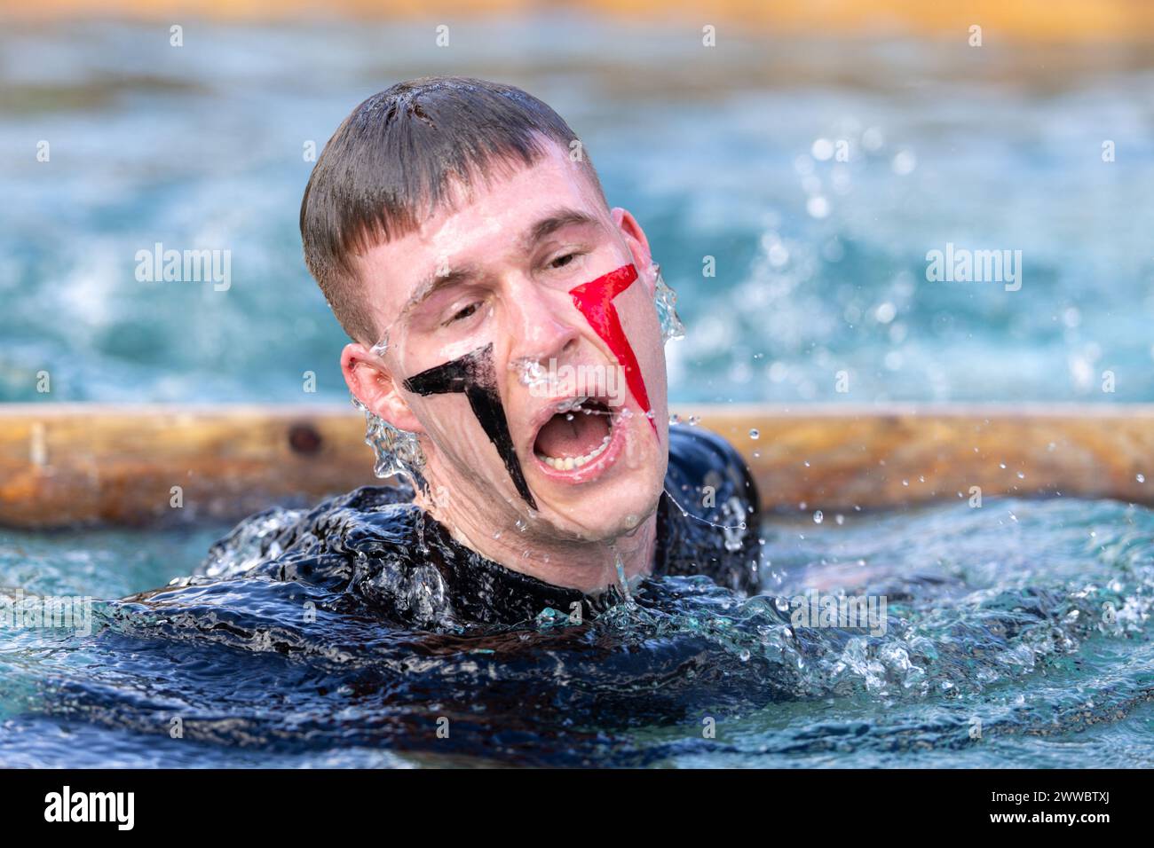 Steinach, Germany. 23rd Mar, 2024. A participant overcomes a water ...