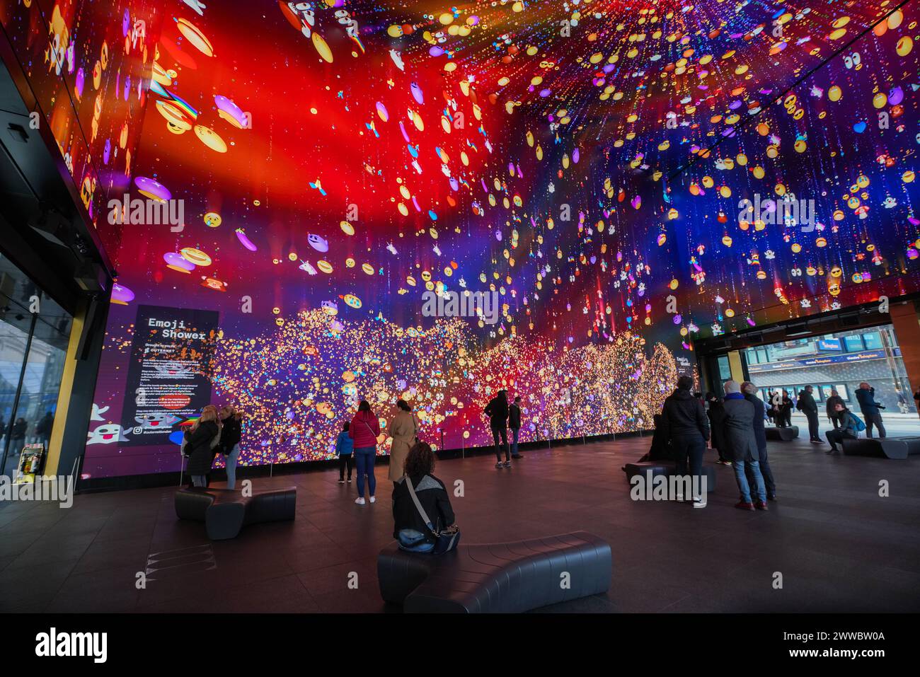 London, UK 23 March March 2024 . People experience the Emoji Shower ...