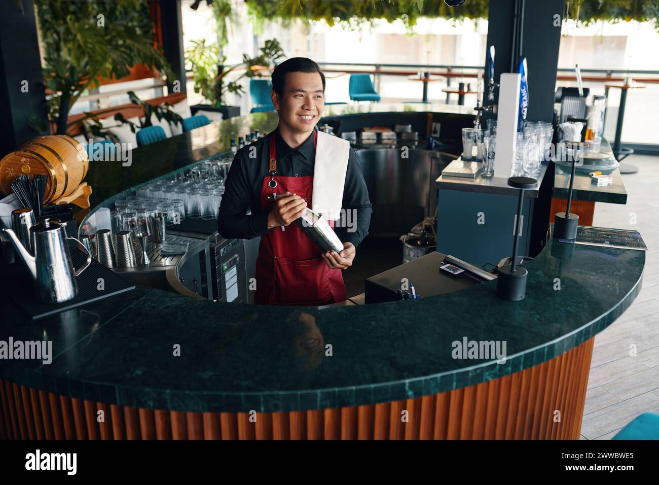 Bartender making cocktail bar counter hi-res stock photography and ...