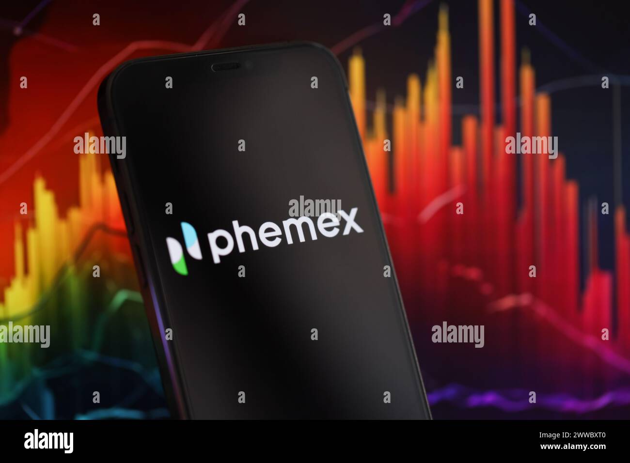 KYIV, UKRAINE - MARCH 15, 2024 Phemex logo on iPhone display screen and ...