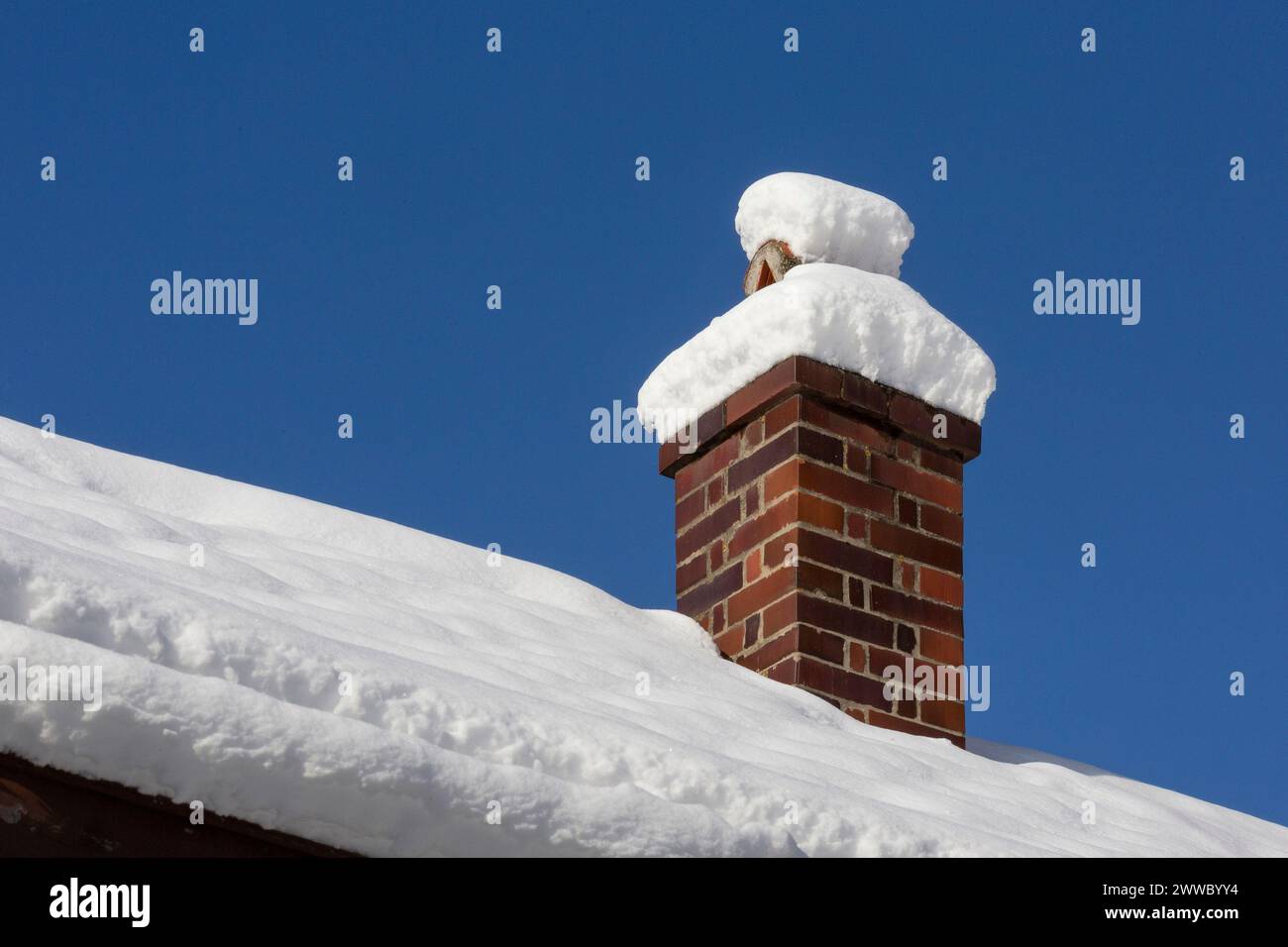 Chimney With Snow Stock Photo - Alamy