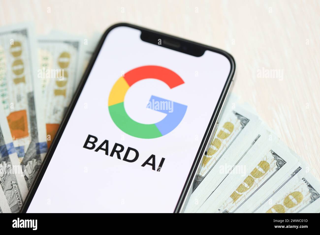 KYIV, UKRAINE - MARCH 17, 2024 Google Bard logo on iPhone display screen with many hundred ...