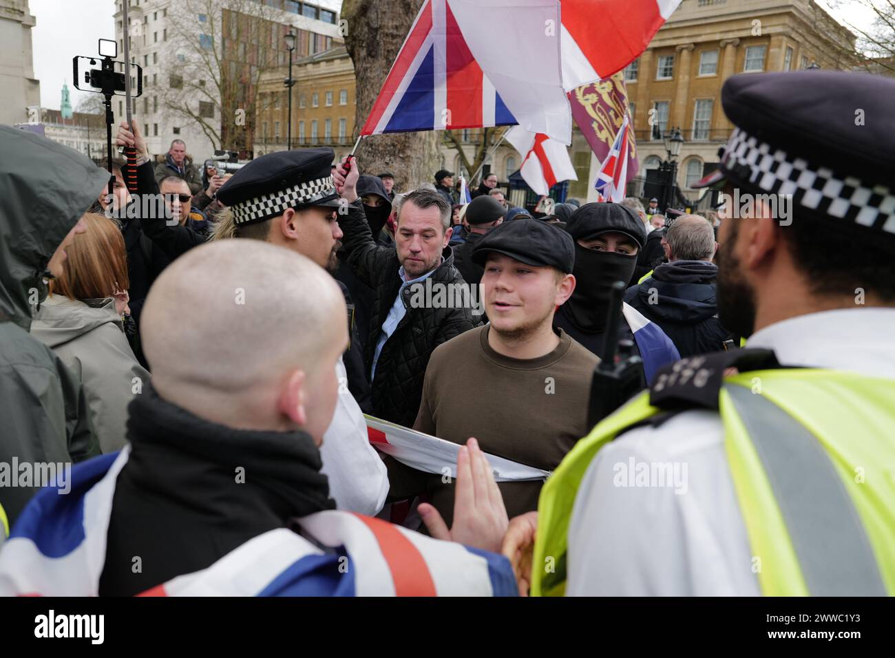 London, UK. 23 MAR 2024. People gathered outside Downing Street to ...