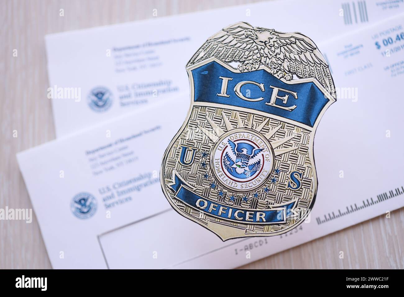 KYIV, UKRAINE - MARCH 9, 2024 US ICE Officer badge on USCIS mail ...