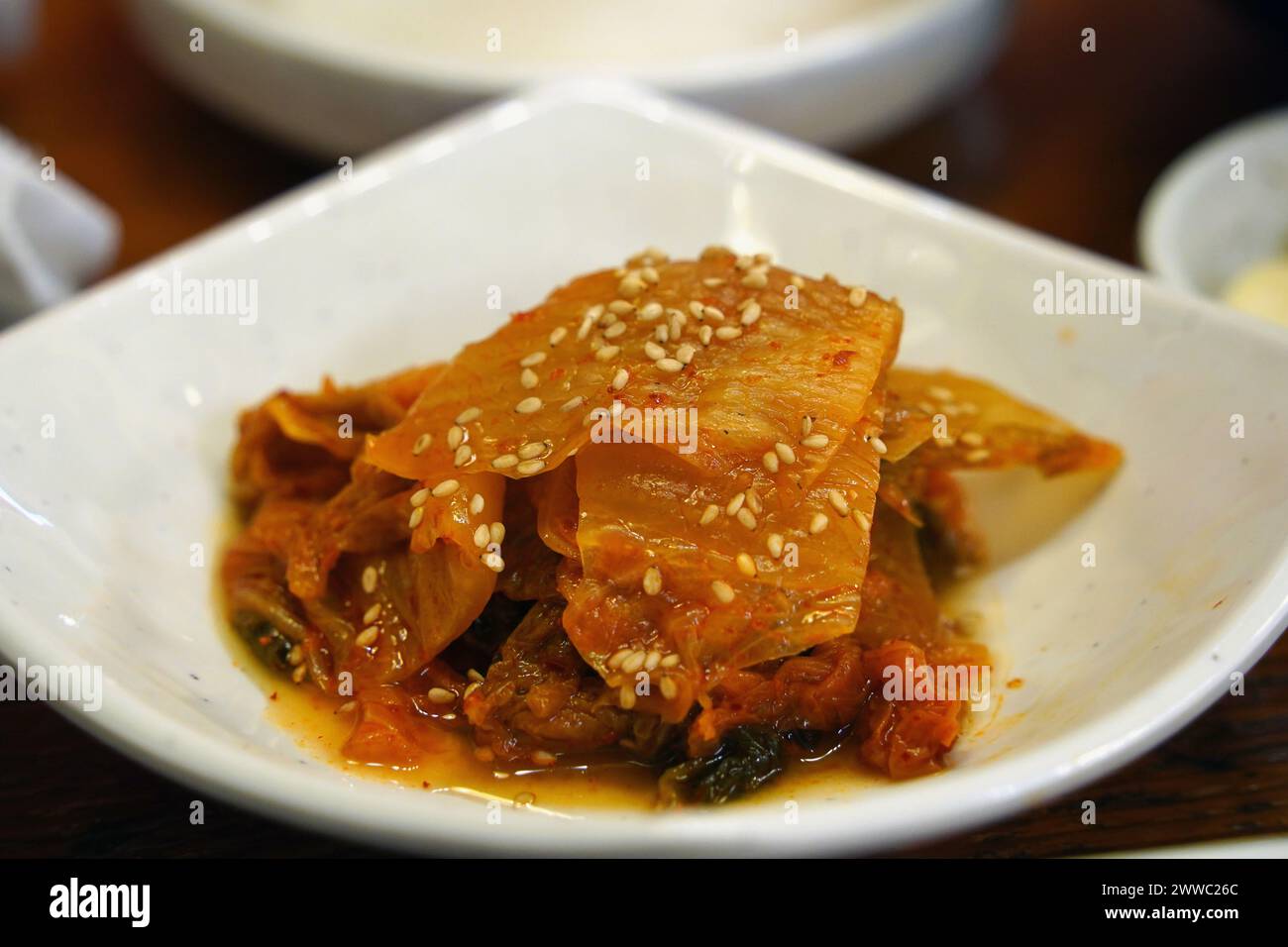 A type of kimchi, especially kimchi that is aged at low temperature for ...