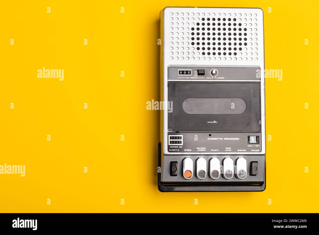 VIntage portable tape recorder with open cover and compact cassette ...